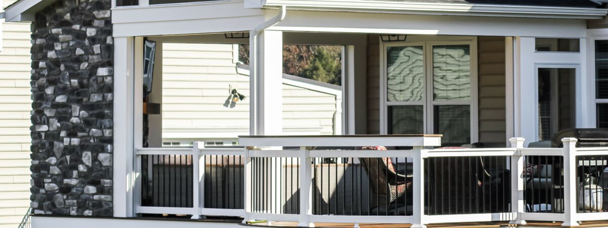 Covered TimberTech Deck with Phantom Screens - Integrous Fences and Decks